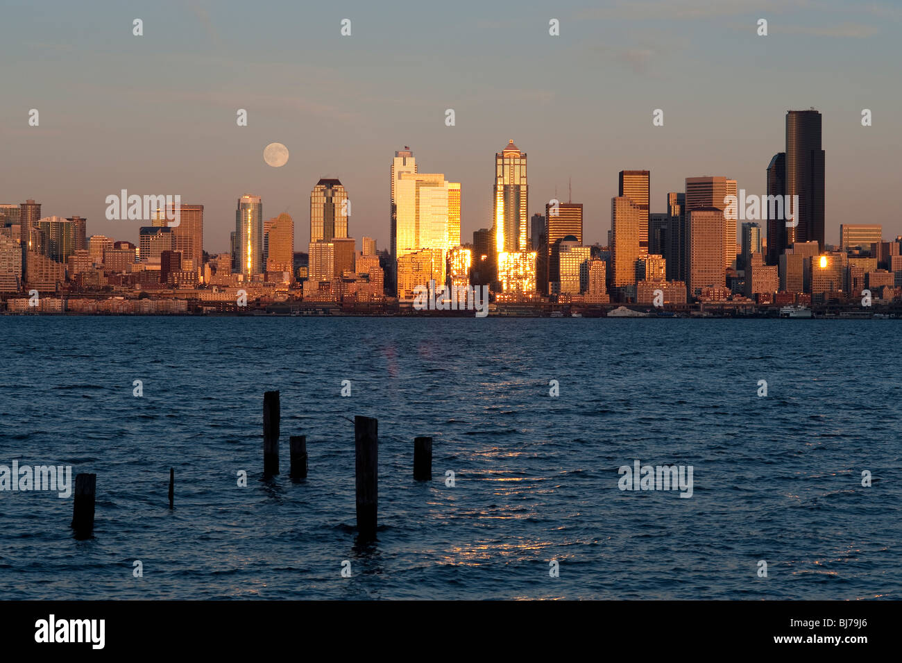 Seattle skyline from West Seattle at sunset with moonrise over Elliott ...