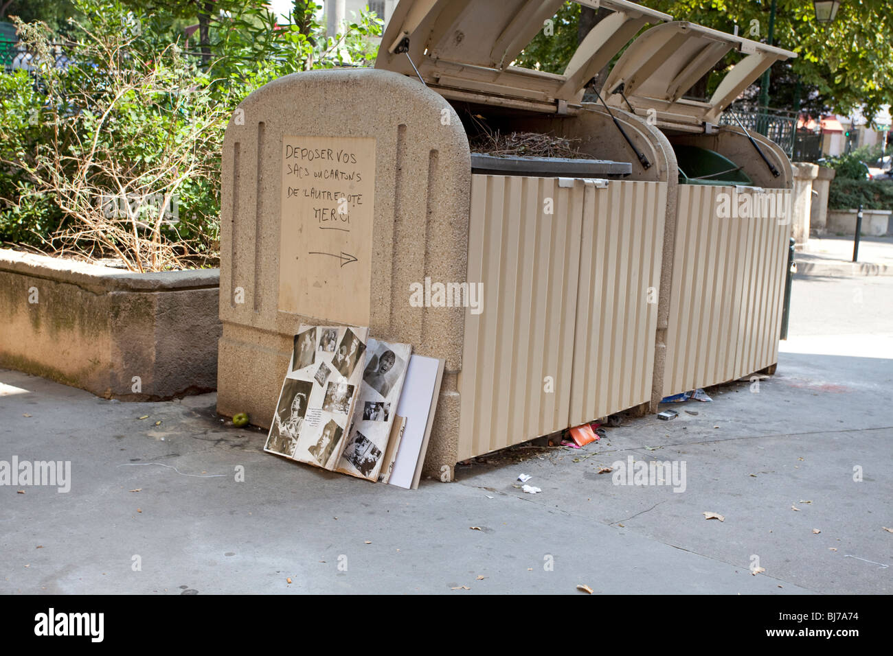 Trash containers on a street in the South of France Stock Photo - Alamy