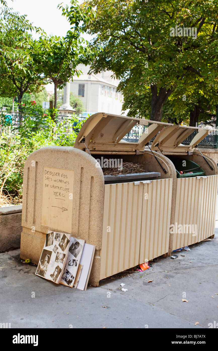 Trash containers on a street in the South of France Stock Photo - Alamy