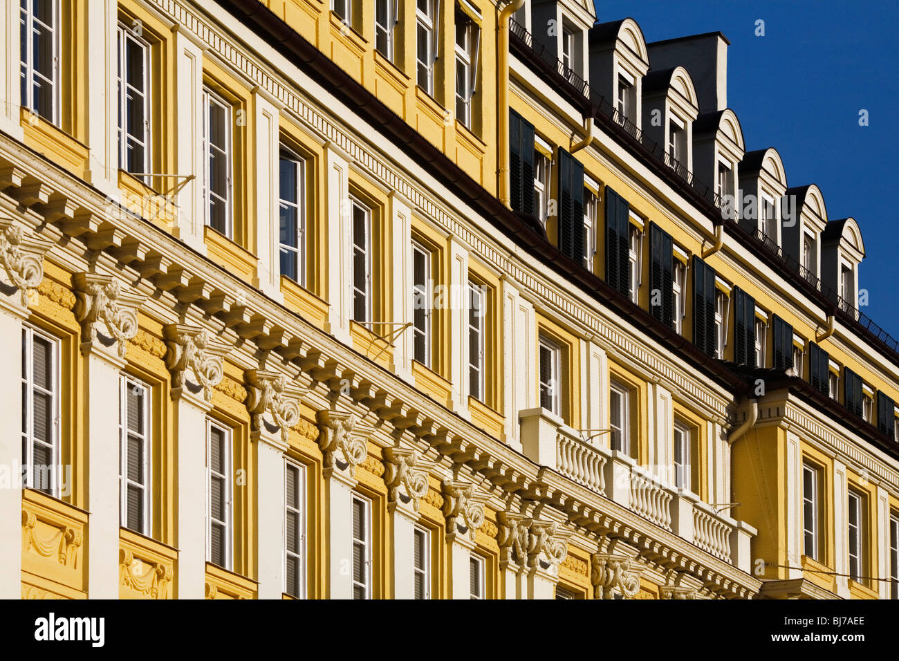 Traditional and very classy yellow building in Residenzstrasse. Munich ...