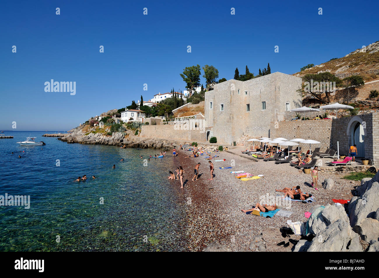 Mikro Kamini beach, Castello café, Hydra island, Greece Stock Photo - Alamy