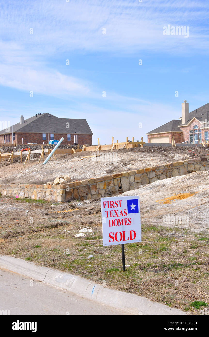 Lot for house to be constructed SOLD sign Stock Photo - Alamy