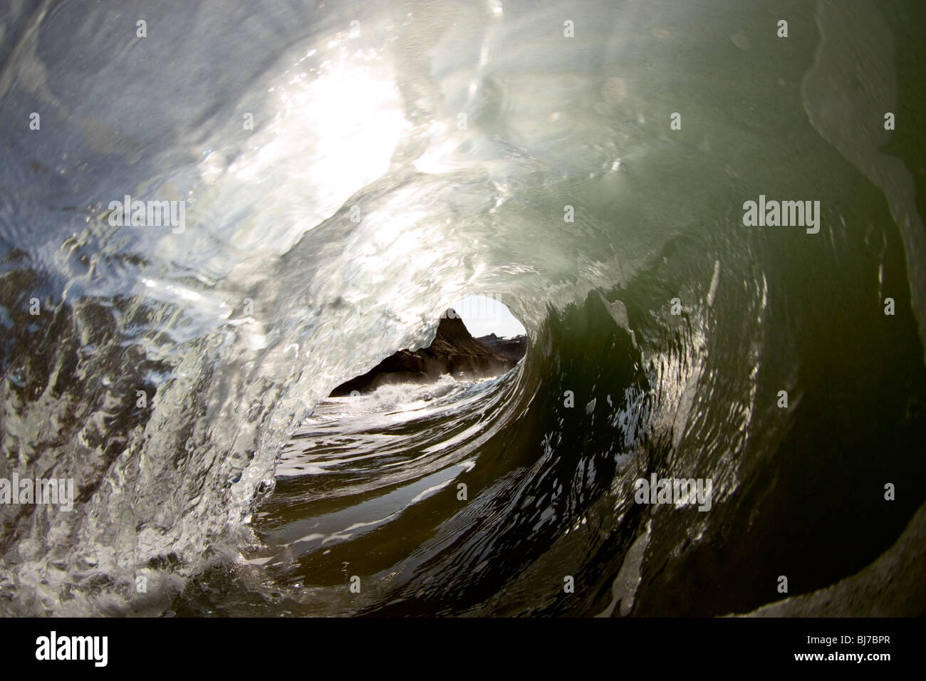 The surfer's perspective looking out from inside the barrel of a wave ...