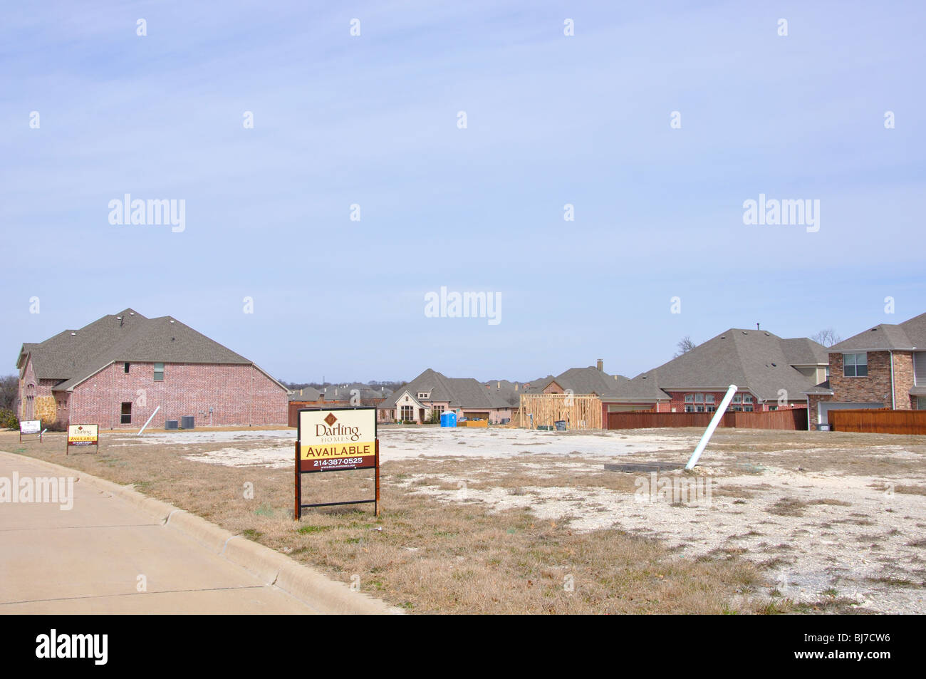 AVAILABLE sign on lot for house to be constructed Stock Photo - Alamy