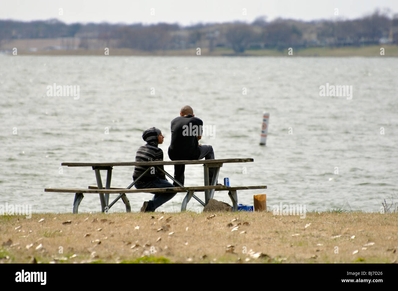 Young muslim couple having talk Stock Photo - Alamy