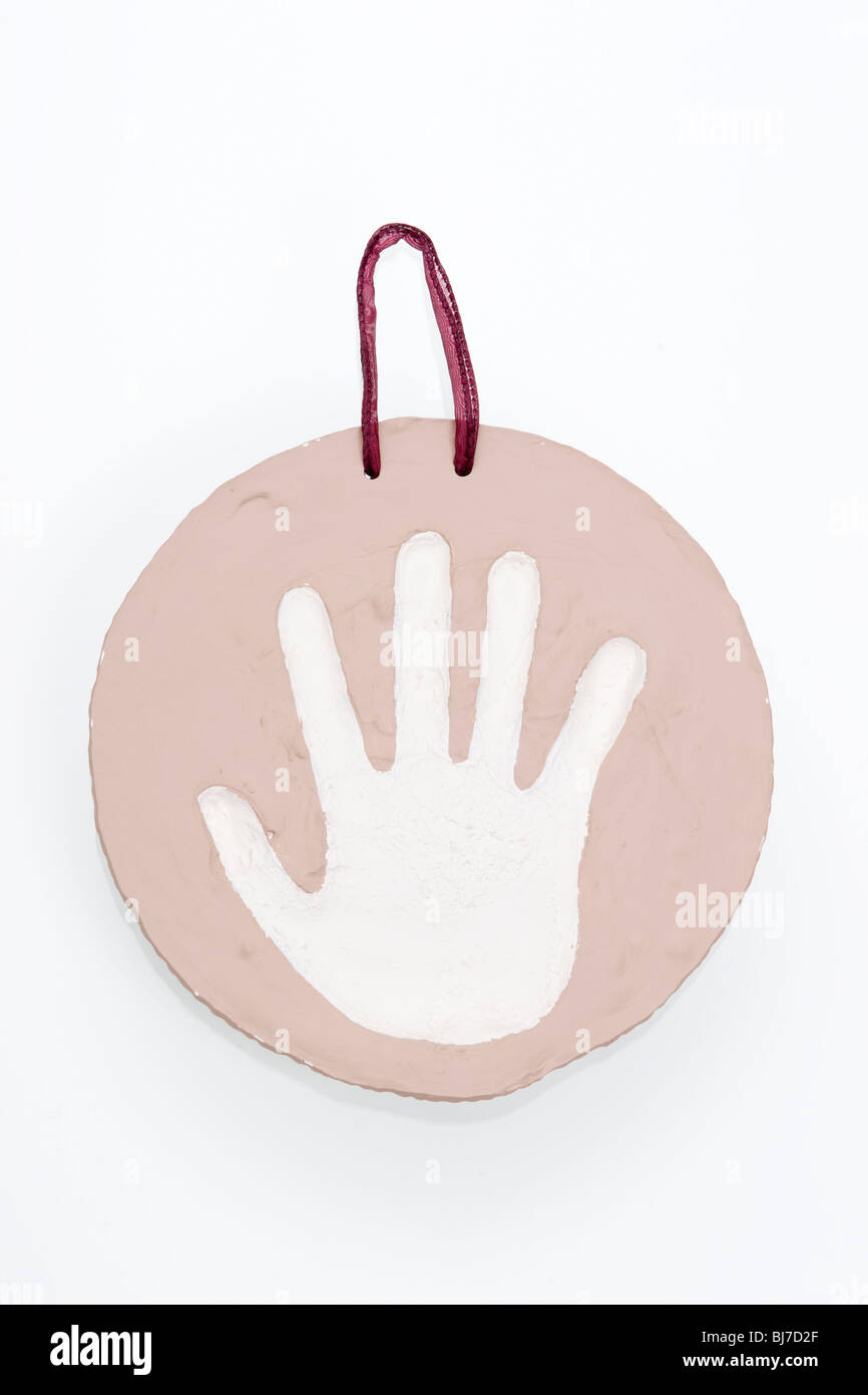 childs plaster handprint school project Stock Photo - Alamy