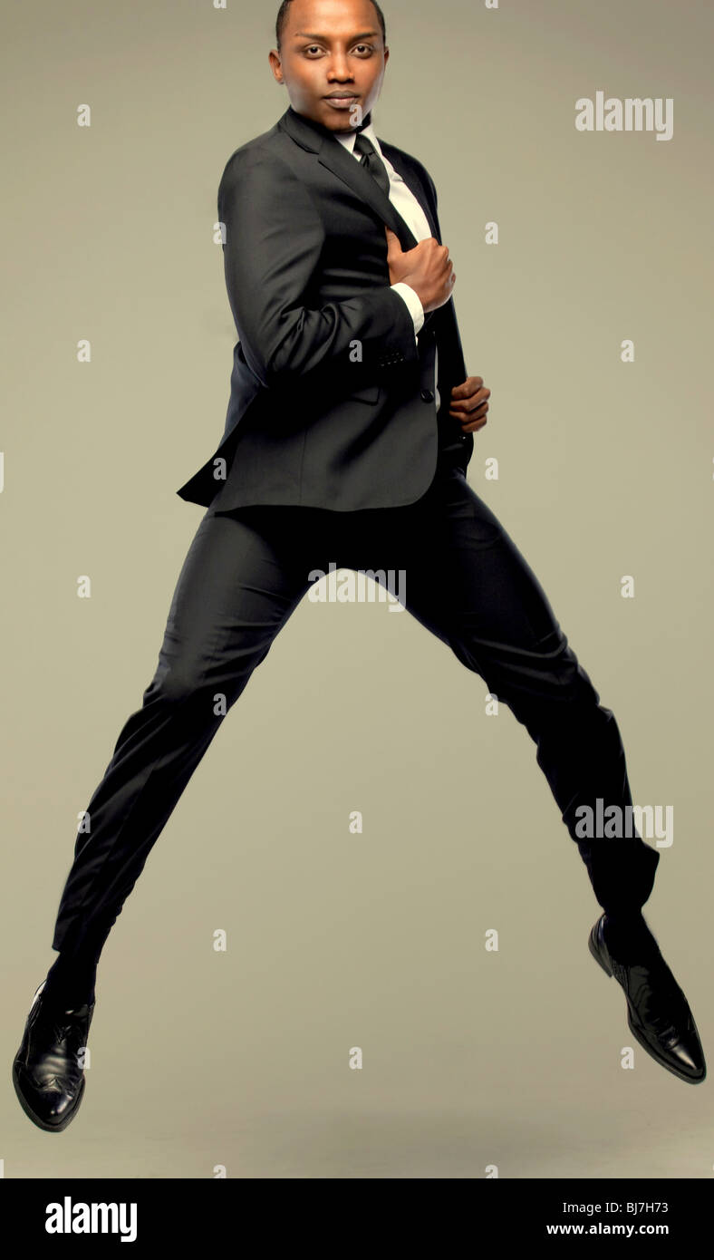 Happy Top Model jumping Stock Photo - Alamy