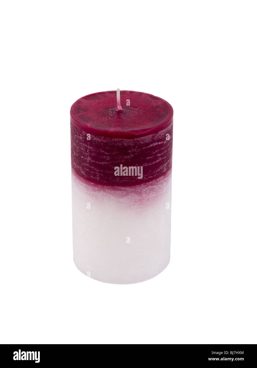 Red and white candle on white background Stock Photo - Alamy
