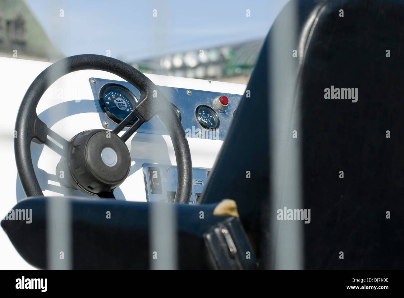 Driver wheel under the grating Stock Photo - Alamy