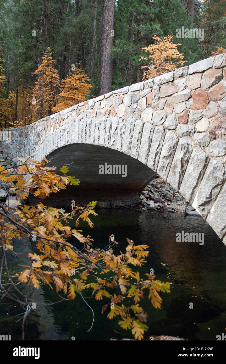 Yosemite National Park highway bridge over the Merced River in the fall ...