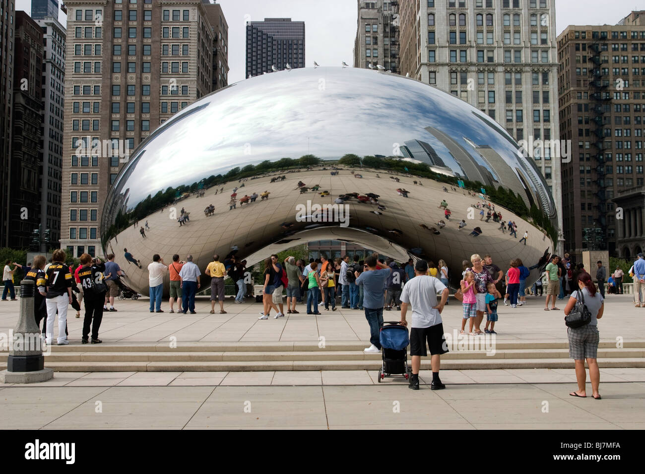 Cloud Gate sculpture, nicknamed "The Bean," resides in Millennium Park ...