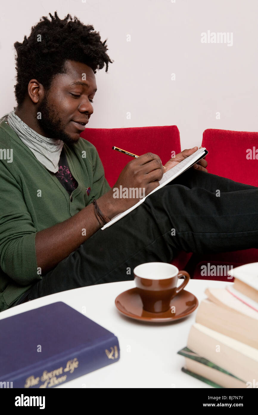 Man casually holding coffee cup hi-res stock photography and images - Alamy