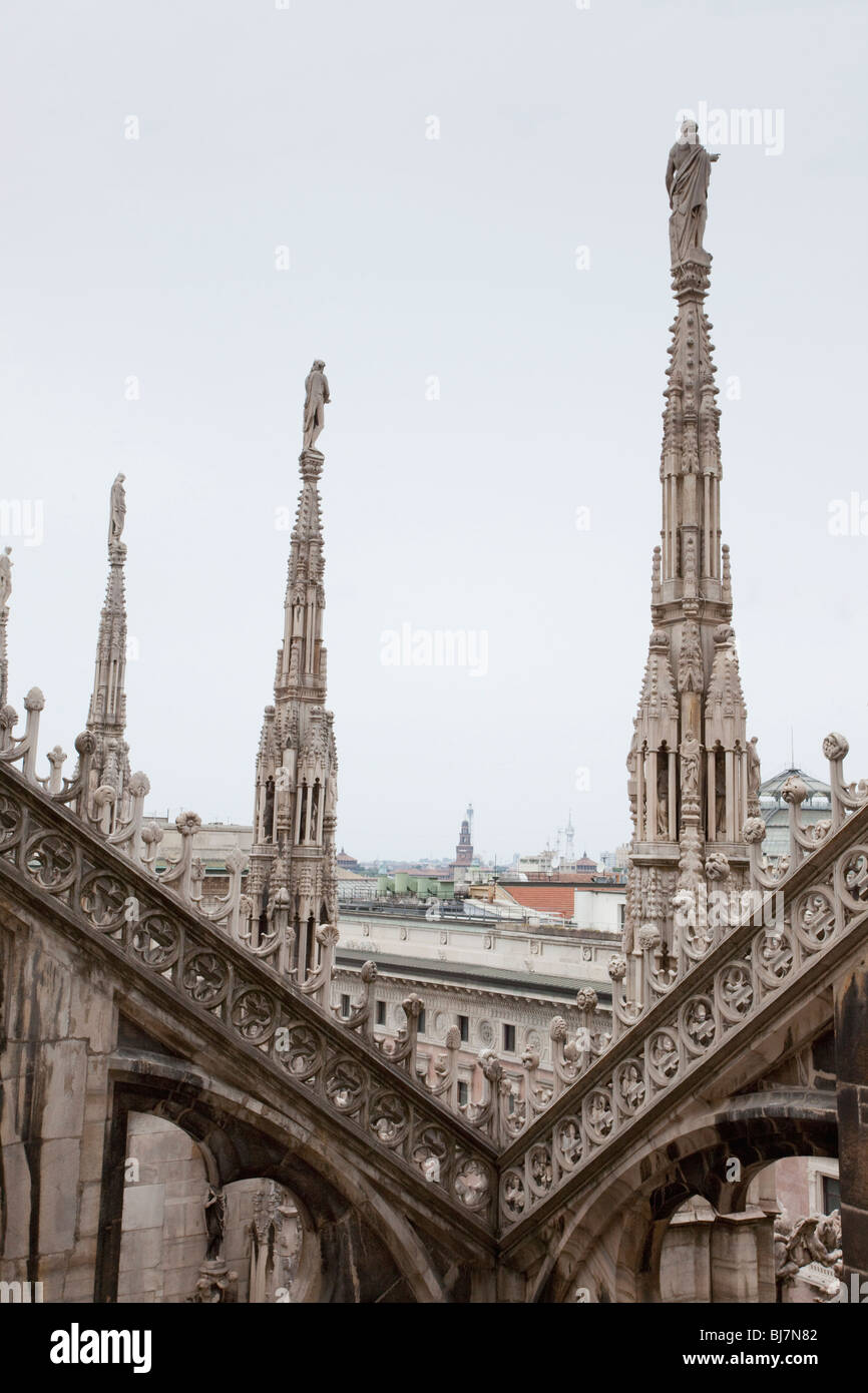 The intricate Gothic spires of Milan Cathedral (Duomo di Milano) soar ...