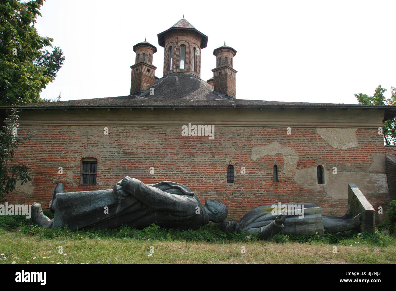 Discarded statues of Romanian Communist Prime Minister Petru Groza and ...