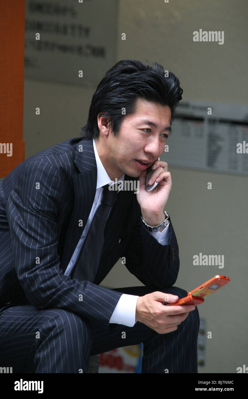 Salaryman commuting in tokyo hi-res stock photography and images - Alamy