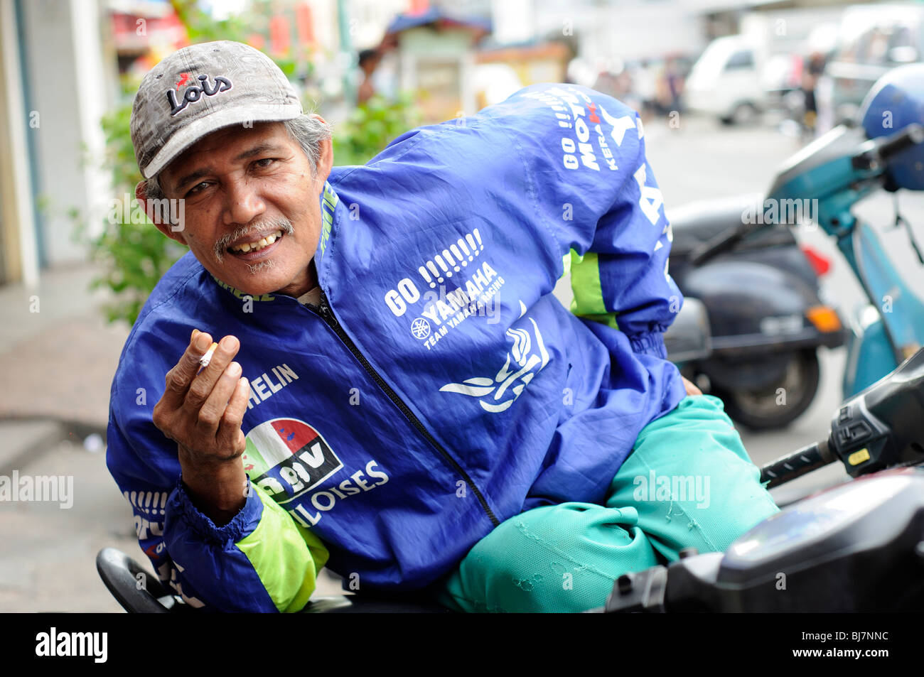 ojek driver, tanjung Pinang, Bintan, Indonesia Stock Photo - Alamy