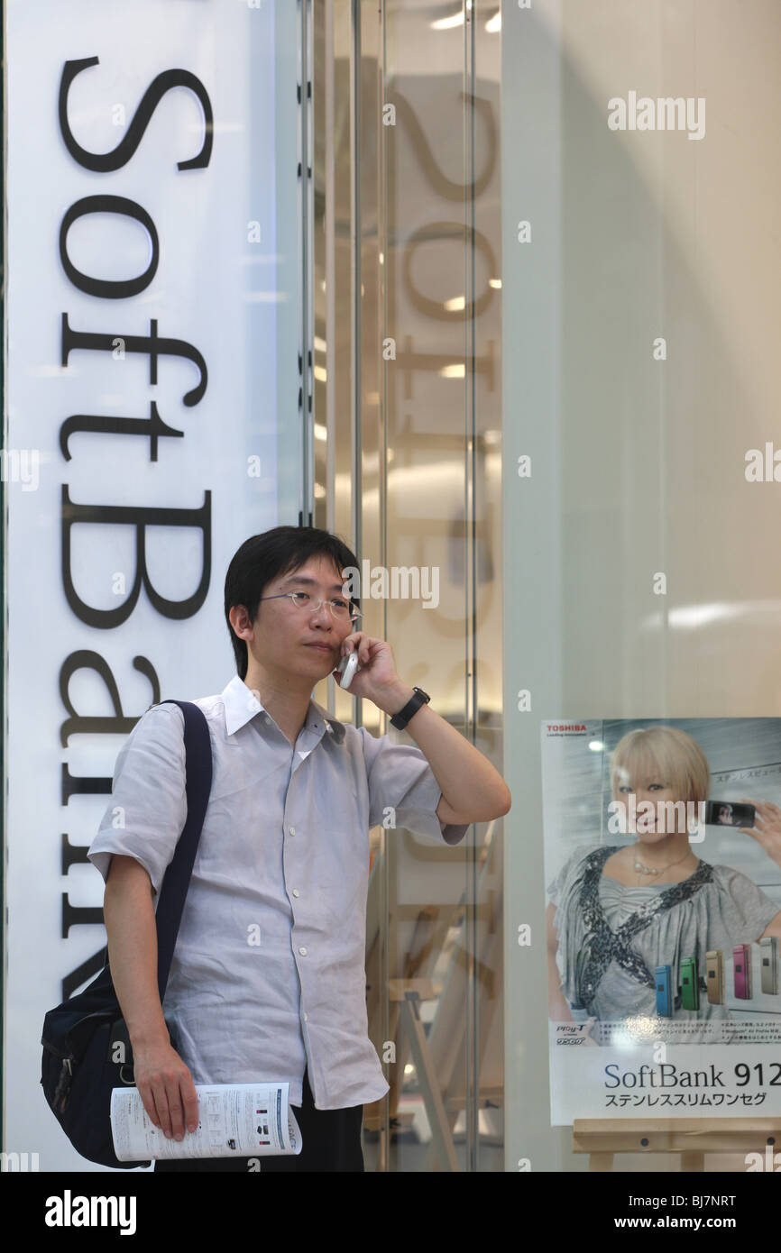 Japanese mobile telephone use by commuters and public in Tokyo, Japan ...