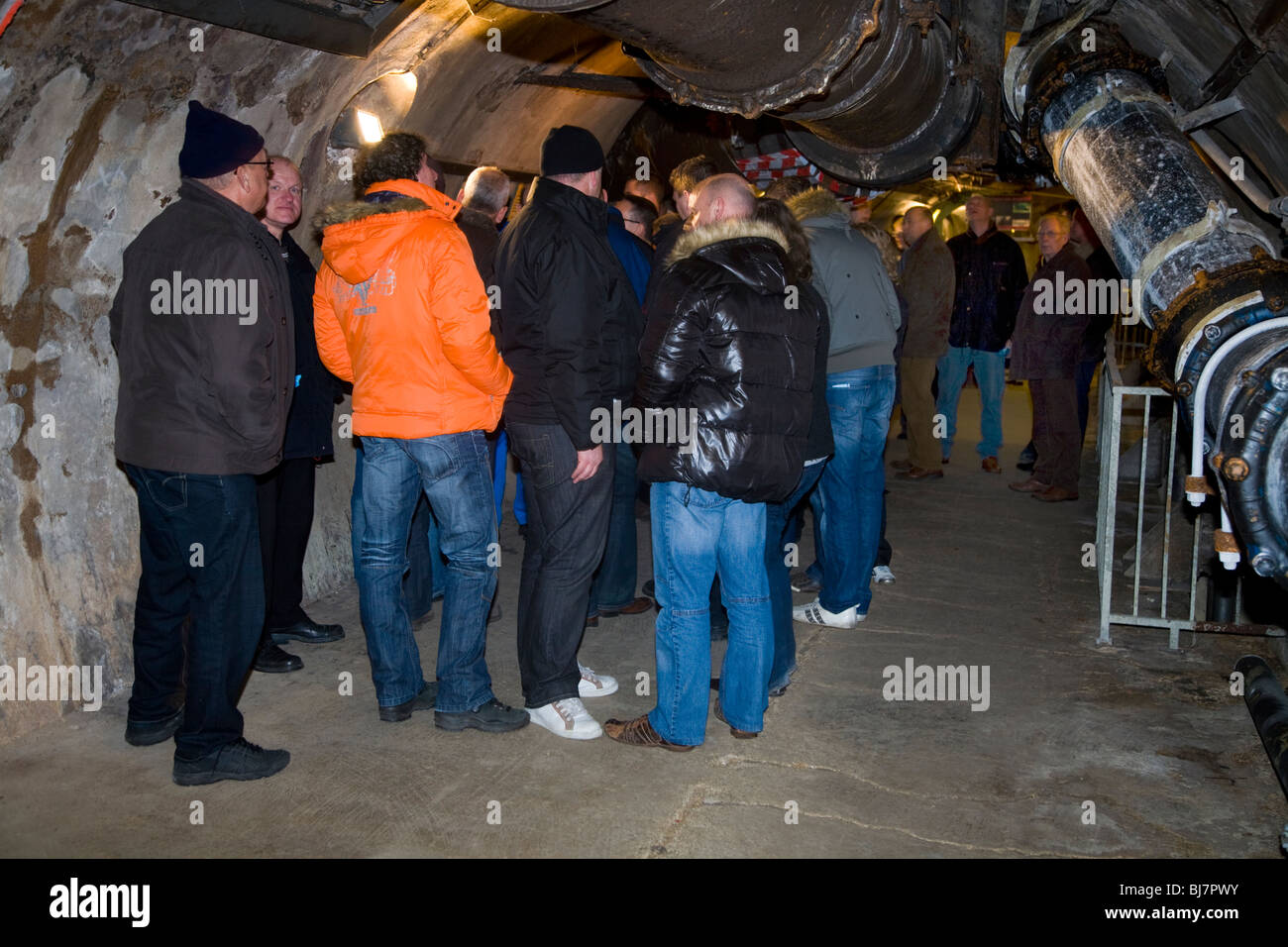 Group of tourists / tourist party tour inside Paris sewers – Visite Des ...