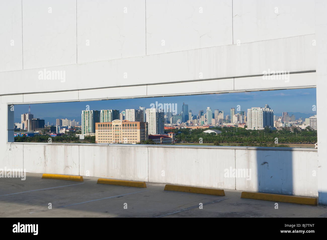 Manila skyline through panoramic window; Manila; Philippines Stock ...