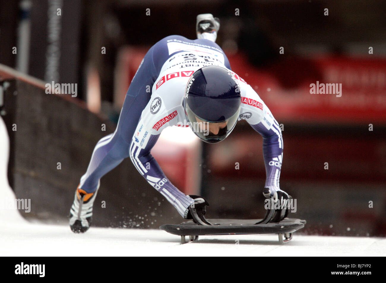 Skeleton Slider Leaps onto Sled at the start of the run Stock Photo - Alamy