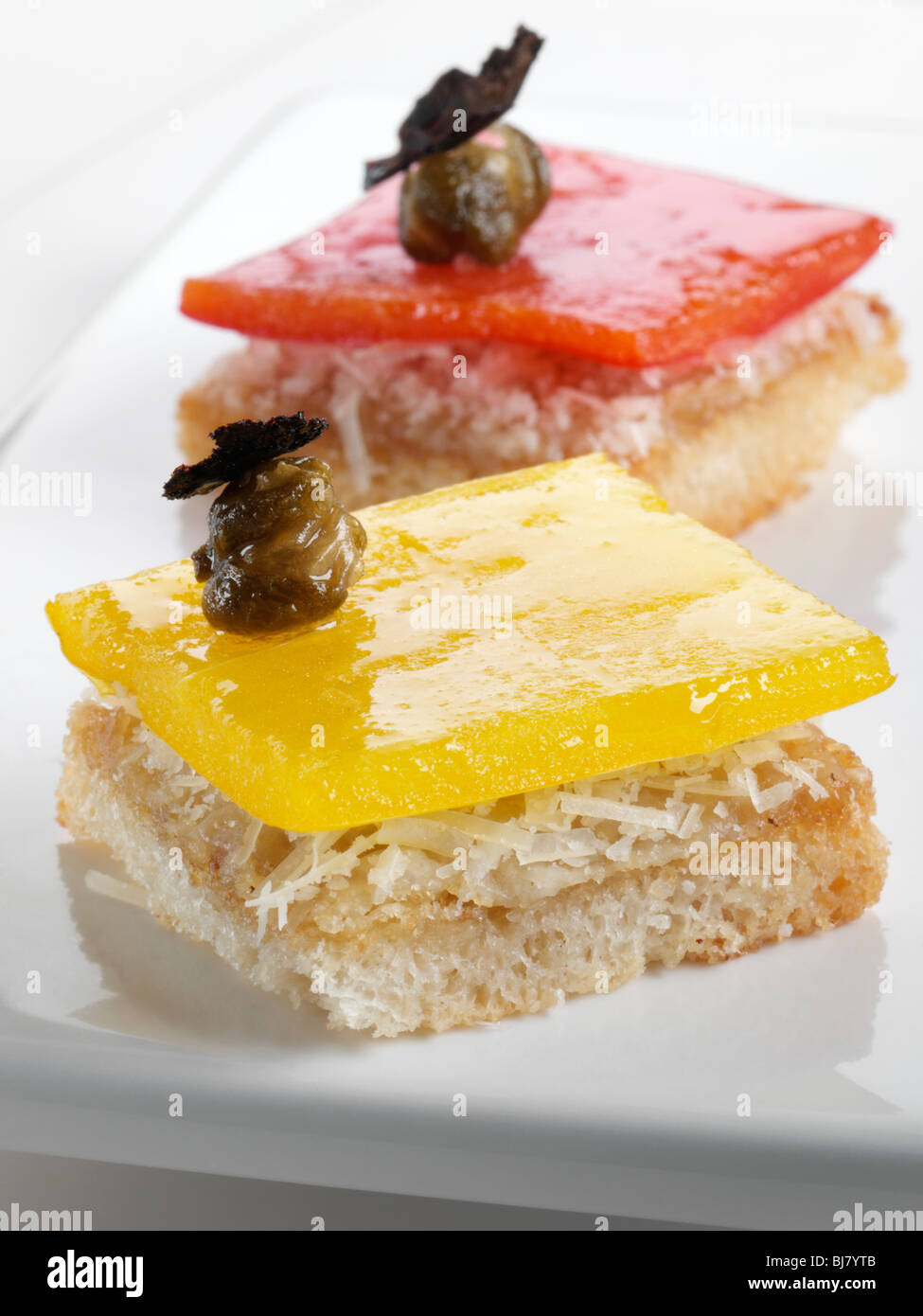 Caper bell pepper tart canapes Stock Photo - Alamy