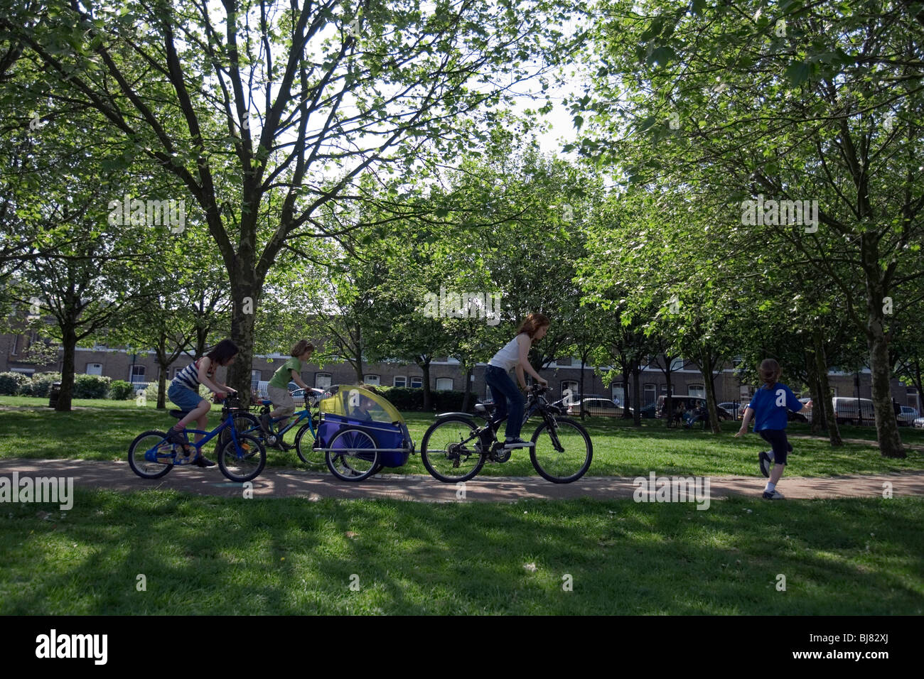 Children play cycle hi-res stock photography and images - Alamy