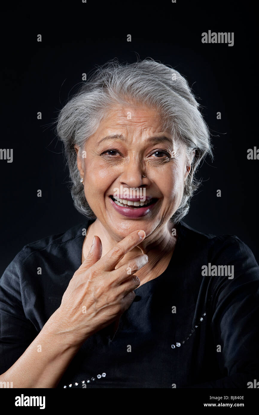 Old woman laughing Stock Photo - Alamy