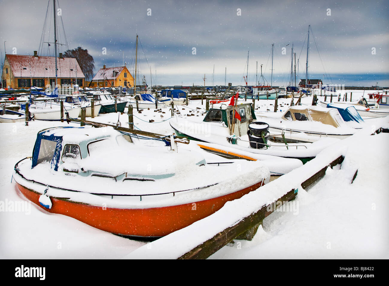 Snowy weather at Dragor harbour Stock Photo - Alamy