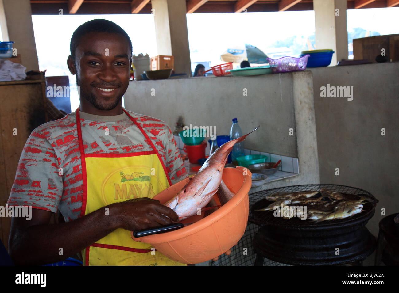 Africa Cameroon Chef Grilled Fish Kribi Meal Men Stock Photo - Alamy