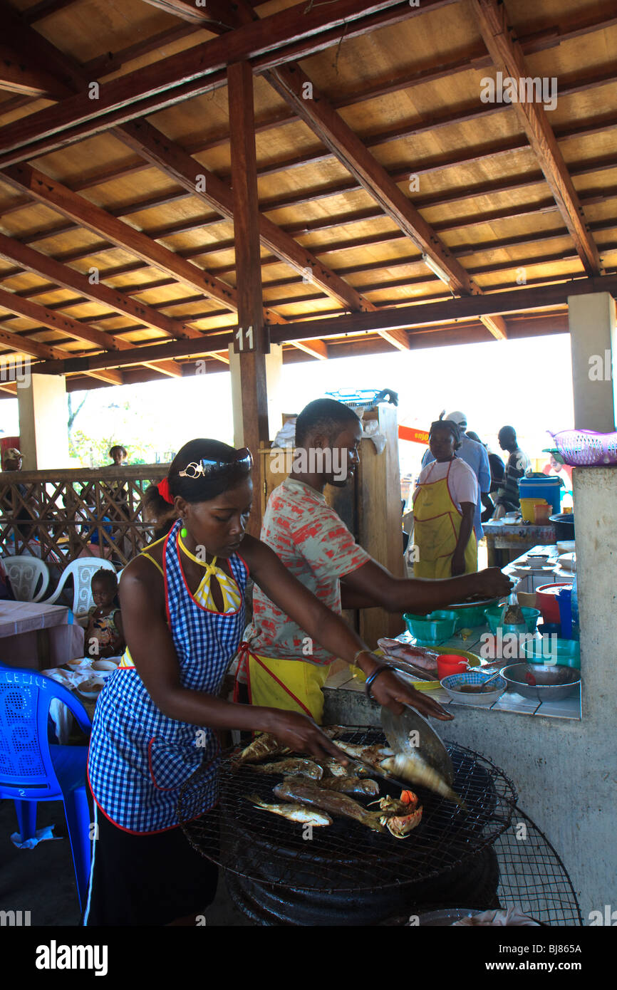 Africa Cameroon Chef Grilled Fish Kribi Men Women Stock Photo - Alamy