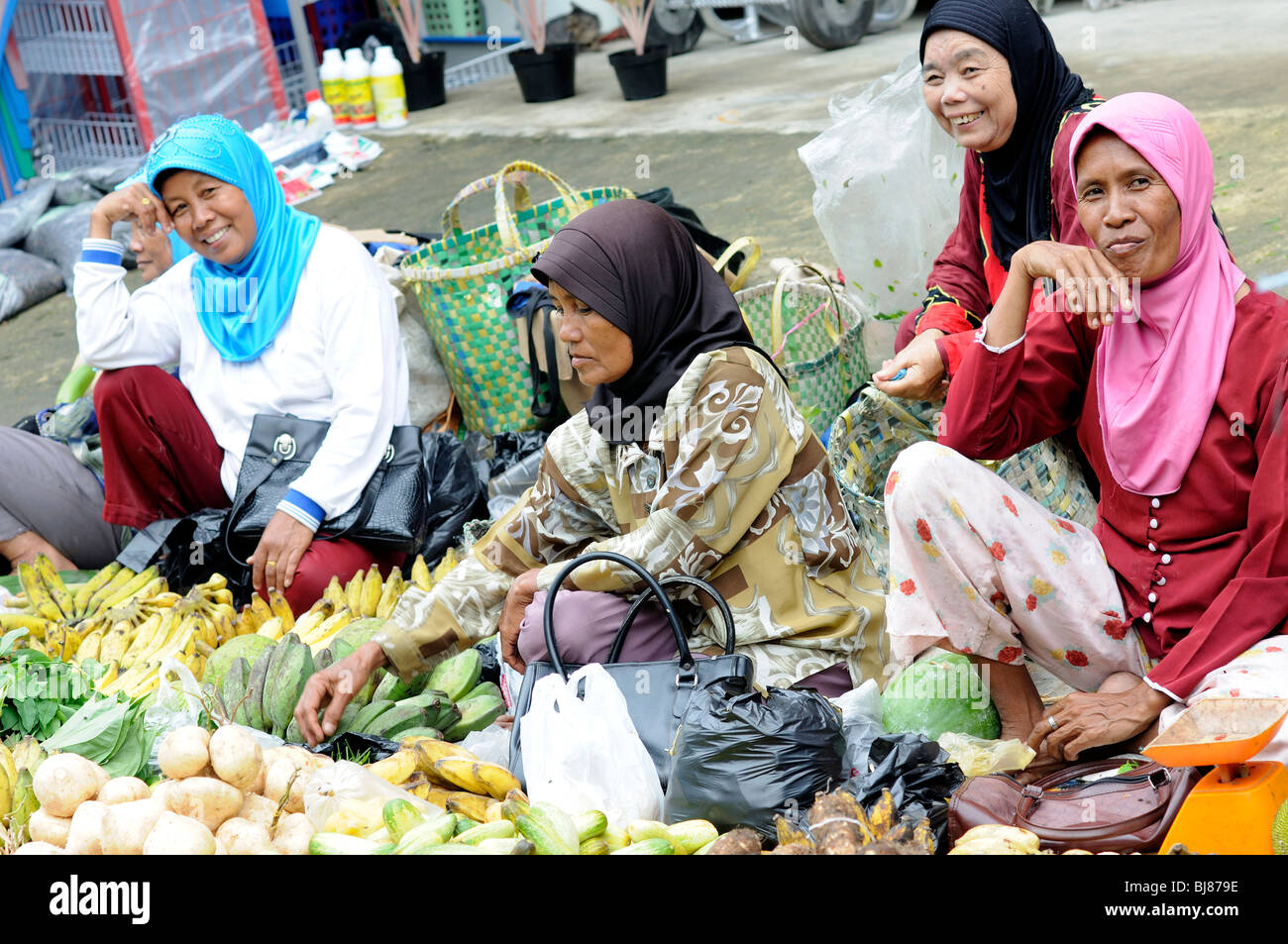 Indonesia people woman women vendor vendors sell selling fruit ...