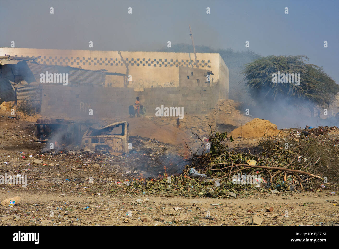 Africa Angola Benguela Fire Rubbish Tips Wrecks Stock Photo - Alamy