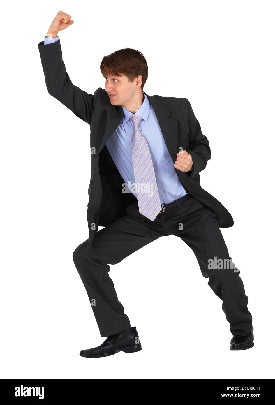 Businessman punching up isolated on a white background Stock Photo - Alamy