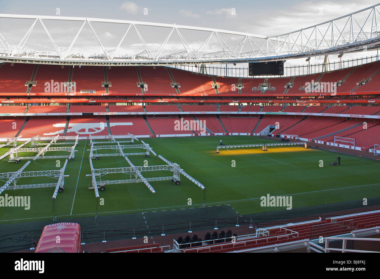 Arsenal stadium and surrounding areas. Pitch and seating with water and ...