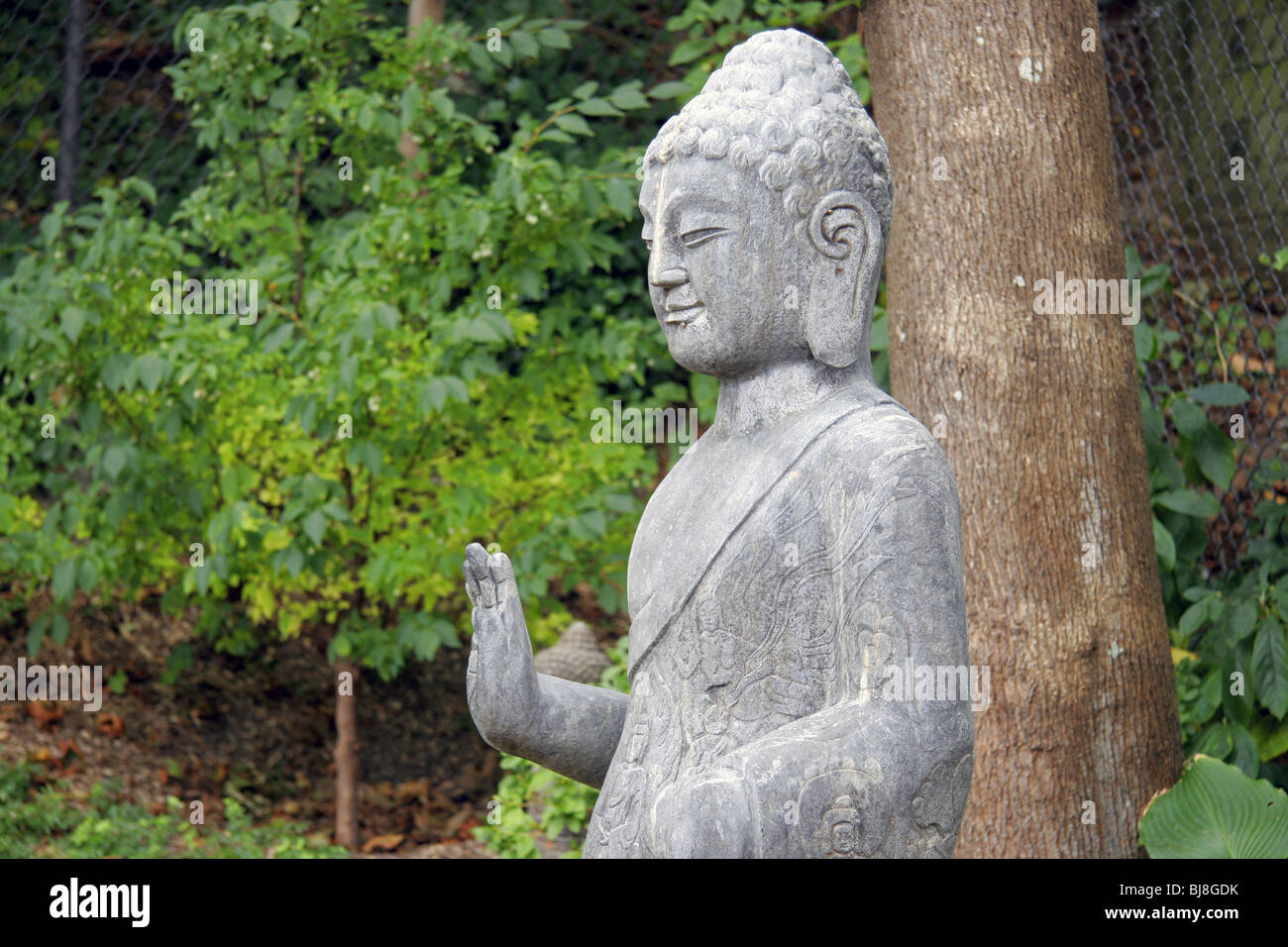 Idol carving hi-res stock photography and images - Alamy