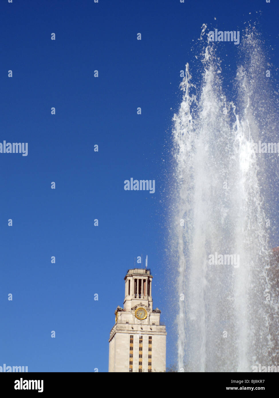 Main clock tower at University of Texas in Austin and fountain Stock ...