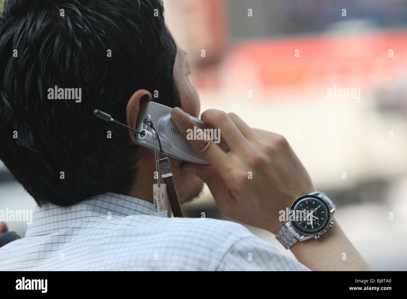 Japanese mobile telephone use by commuters and public in Tokyo, Japan ...