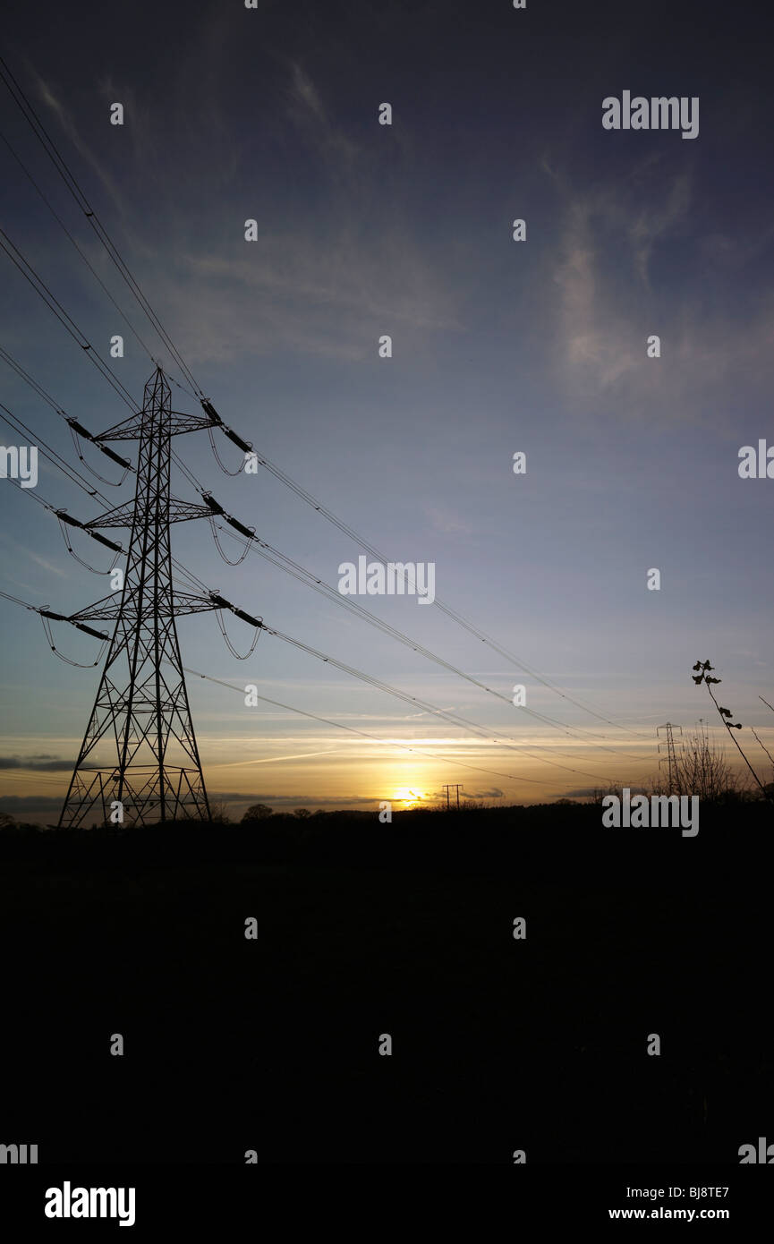electricity pylons in the countryside Stock Photo - Alamy