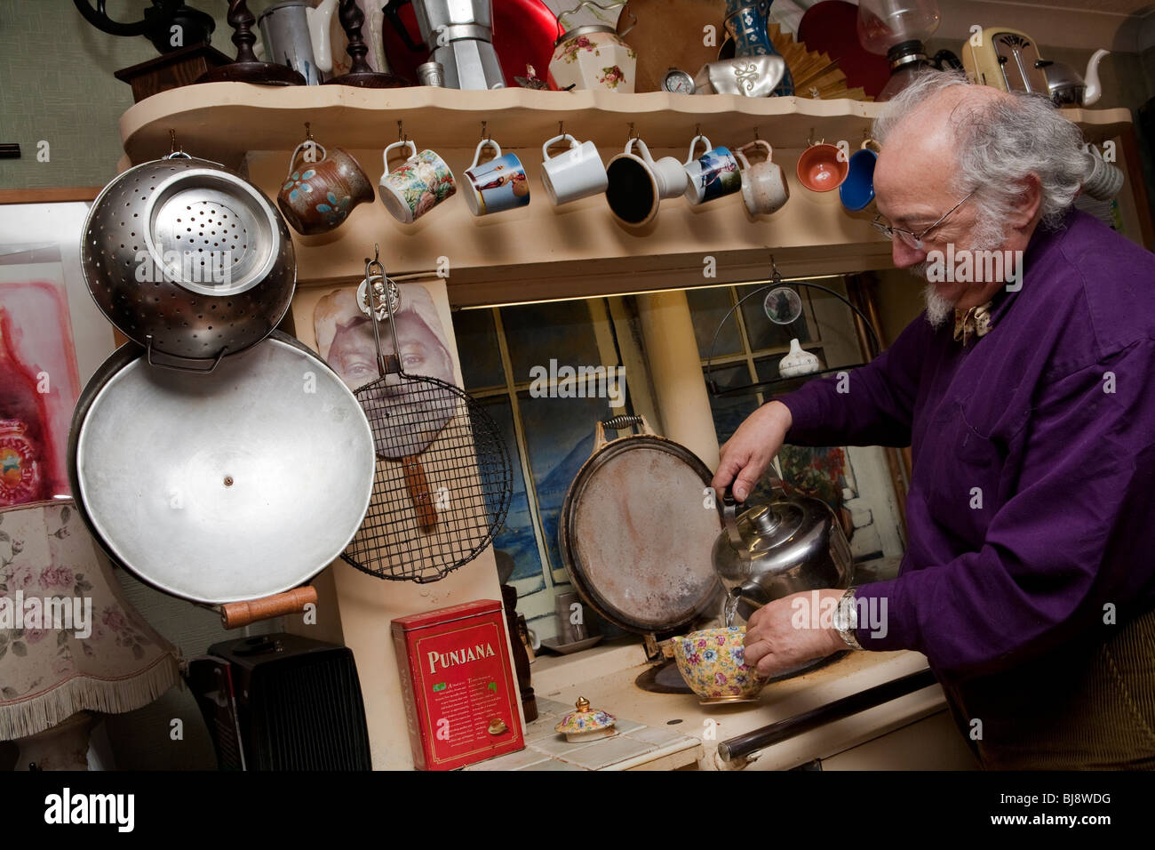 Elderly man preparing tea hi-res stock photography and images - Alamy
