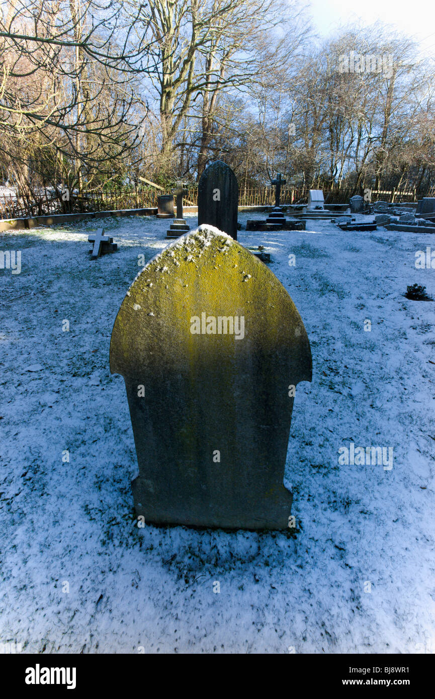 gravestones lit by the sun in a country cemetery Stock Photo - Alamy