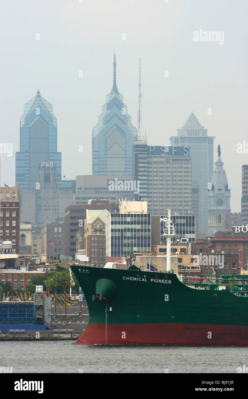 Tanker ship on the Delaware river, in the background the skyline of ...