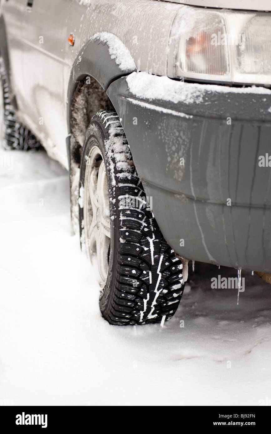 Car wheel in snow Stock Photo - Alamy
