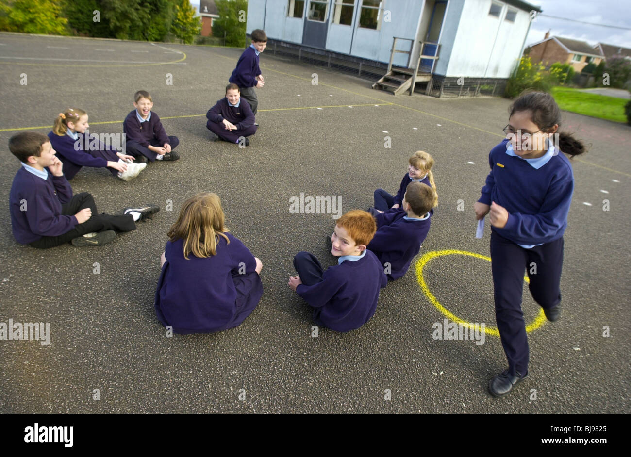"I wrote a letter to my love" traditional playground game being played ...
