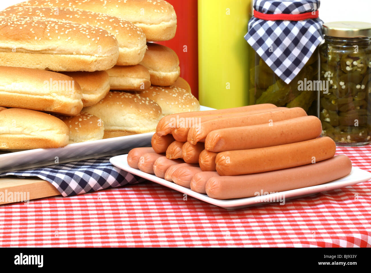 hot dog ingredients on a nice table setting rich in colors and flavors ...