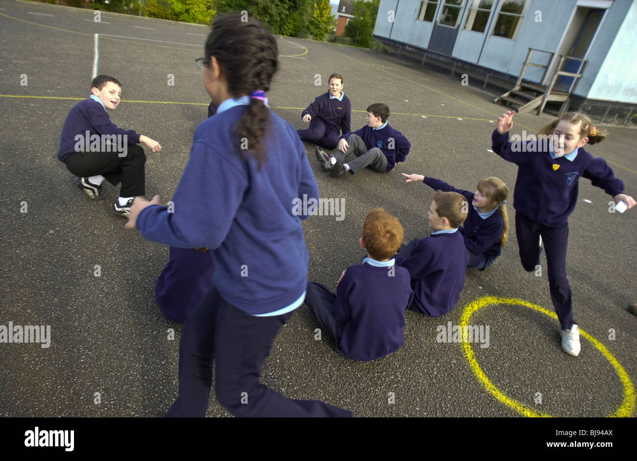 "I wrote a letter to my love" traditional playground game being played ...