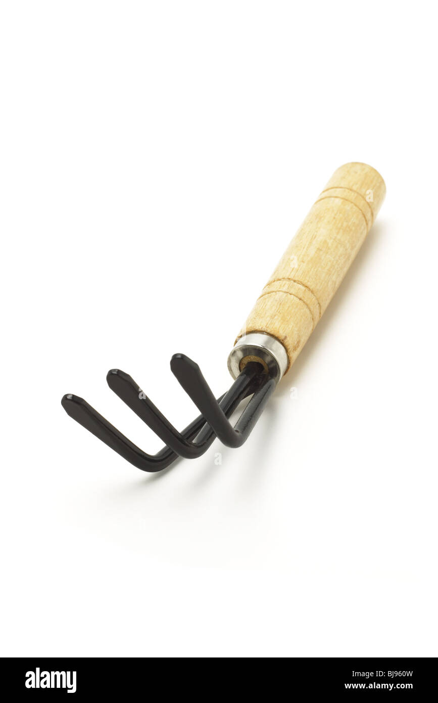 Mini gardening fork with wooden handle on white background Stock Photo ...