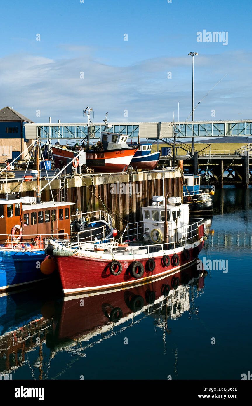 dh STROMNESS ORKNEY Fishingboats alongside quay pier Stromness harbour ...