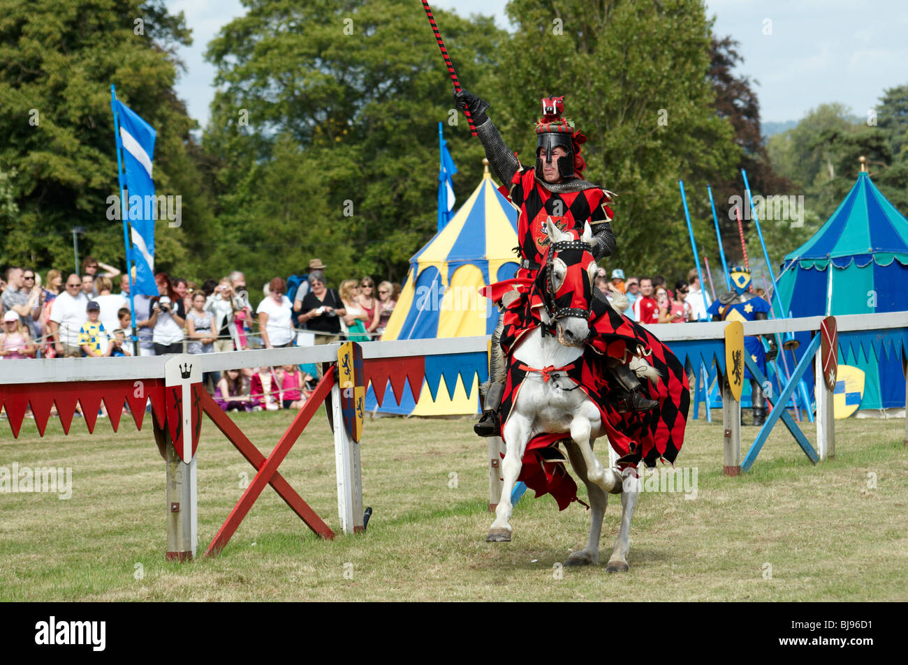 A man in a medieval Knight costume on a horse Stock Photo - Alamy