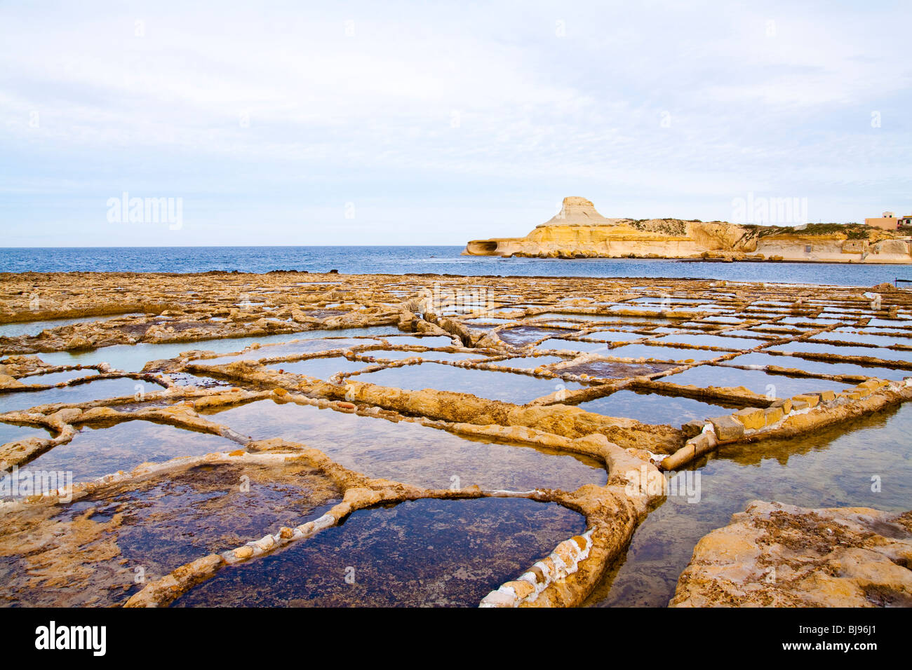 Salt production at coast of Gozo, Malta Stock Photo - Alamy