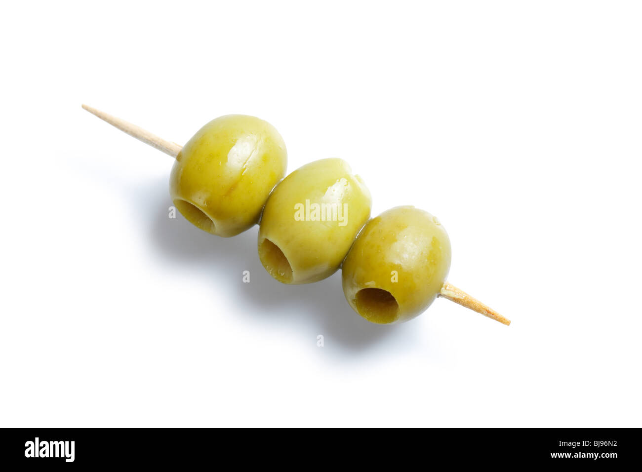 green olives and toothpick Stock Photo - Alamy